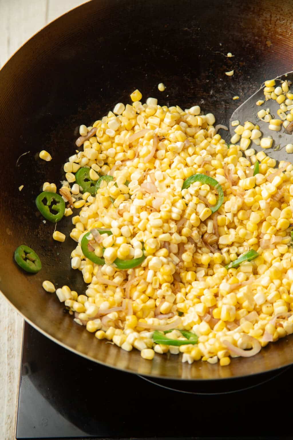 Corn Stir-Fry with Tofu & Jalapeño Peppers - Connoisseurus Veg